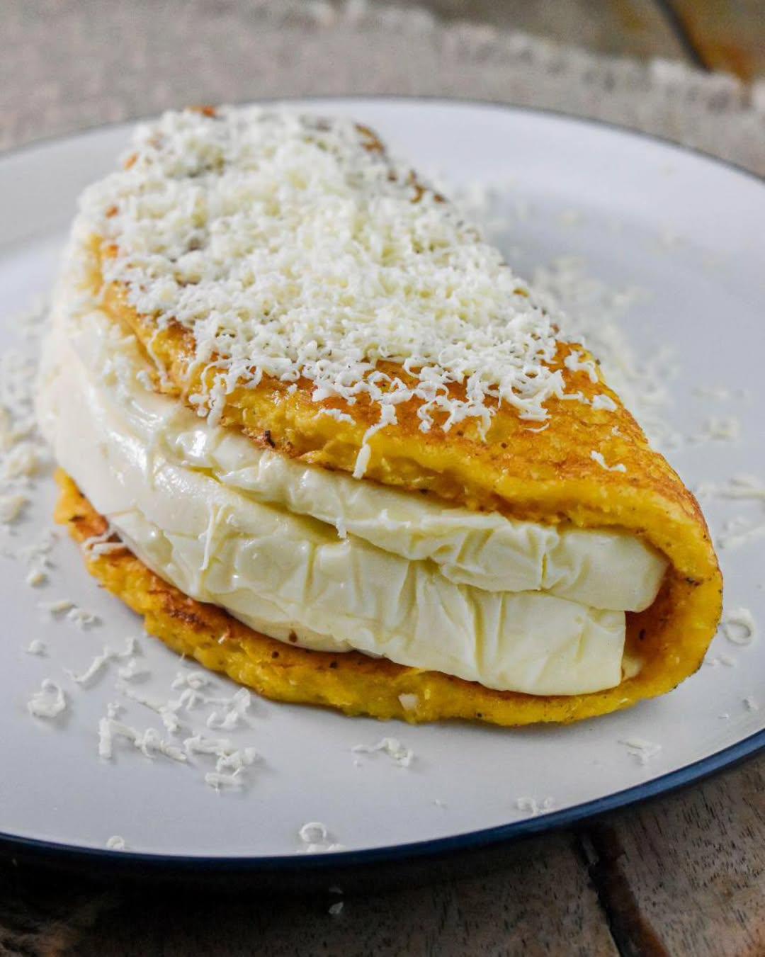 A typical Venezuelan dish, cachapa, is like a corn pancake with tasty ...