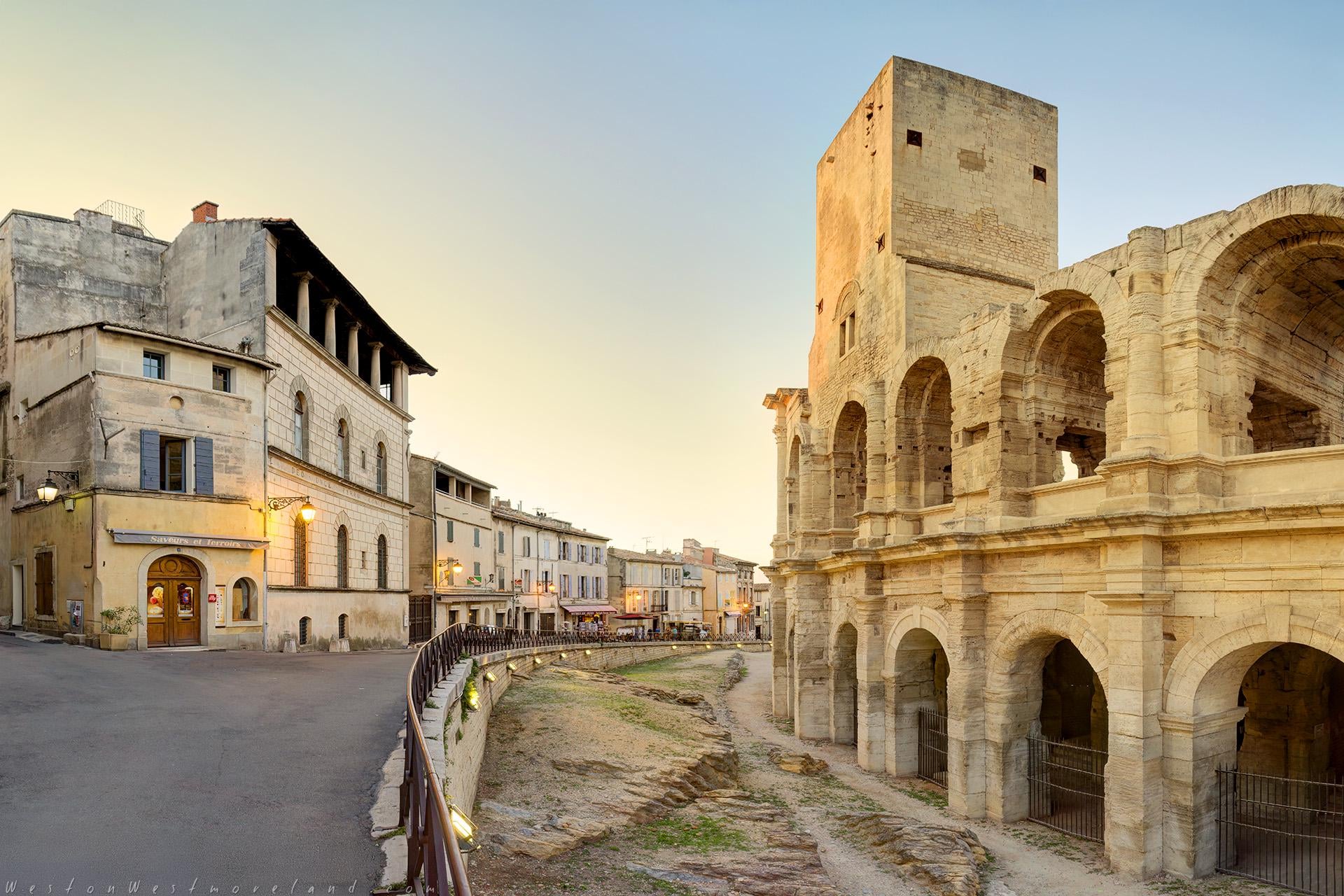 The 18th century buildings of Arles share the urban landscape with a ...